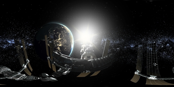 Astronaut and International Space Station Orbiting Earth in Virtual ...