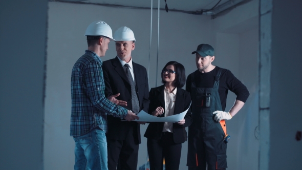 The Architects and Engineers Discussing Blueprint, Stock Footage ...