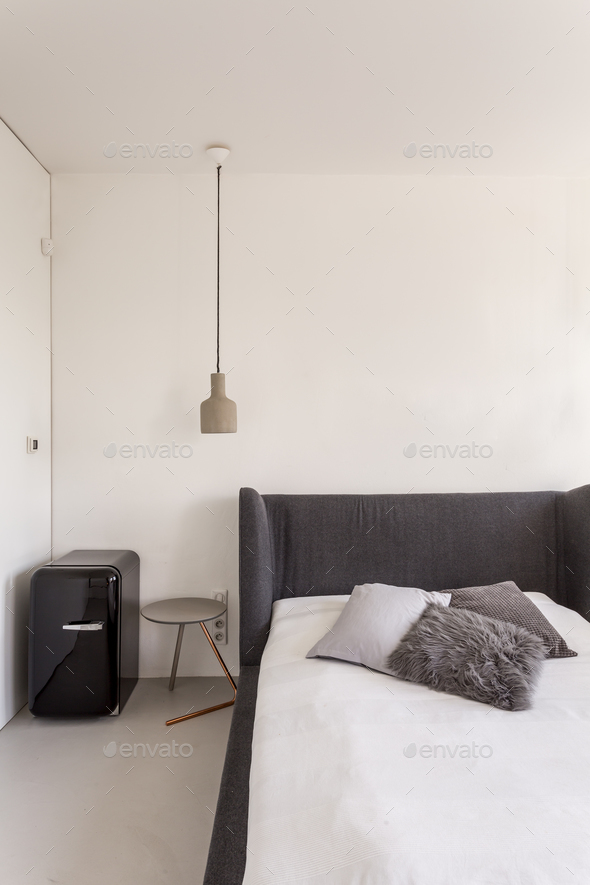 Bedroom with bed and compact fridge Stock Photo by bialasiewicz | PhotoDune