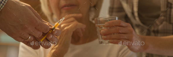 Injection during home visit Stock Photo by bialasiewicz | PhotoDune