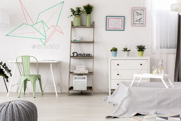 Original origami decoration in bedroom Stock Photo by bialasiewicz