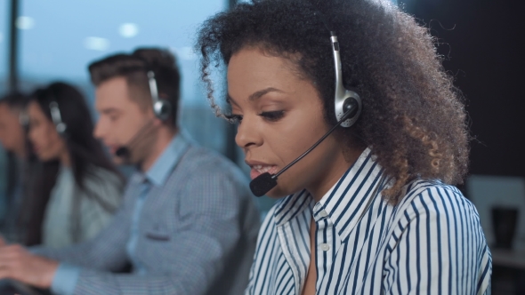Cheerful Woman in Call Center, Stock Footage | VideoHive