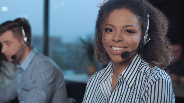 Cheerful Woman in Call Center, Stock Footage | VideoHive