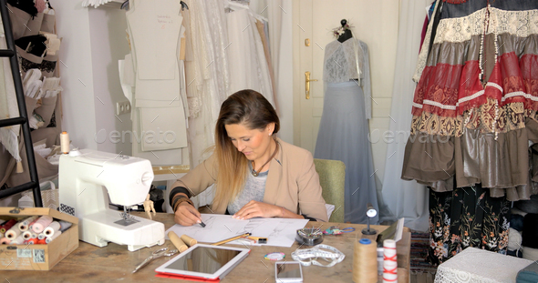 Dressmaker in process of working Stock Photo by Daniel_Dash | PhotoDune