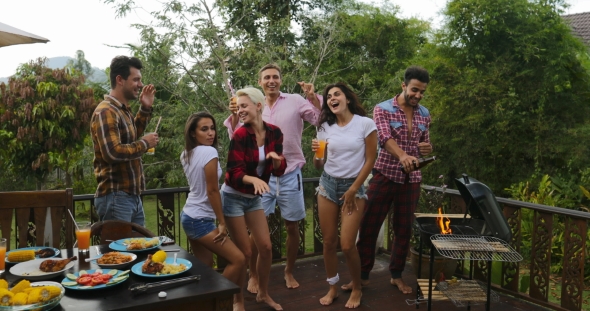 Young People Dancing While Cooking Barbecue Happy Group Cheerful ...