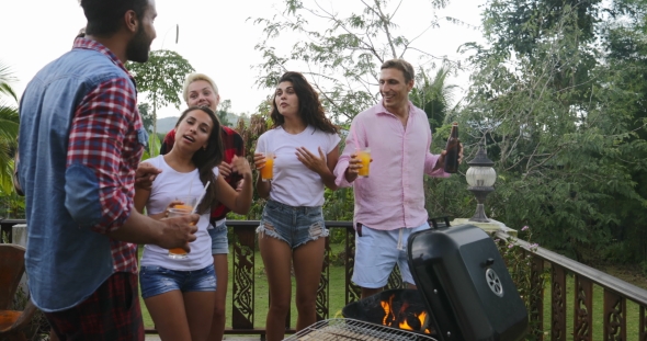 Young People Dancing While Cooking Barbecue Happy Group Cheerful ...