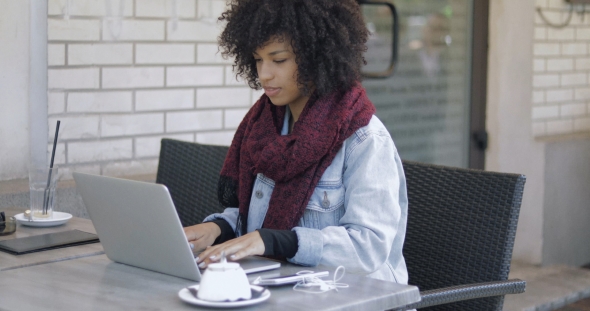 Beautiful Female with Pc in Cafe, Stock Footage | VideoHive