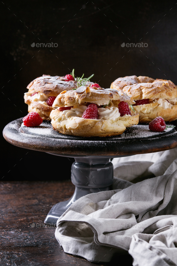 Choux cake Paris Brest with raspberries Stock Photo by NatashaBreen