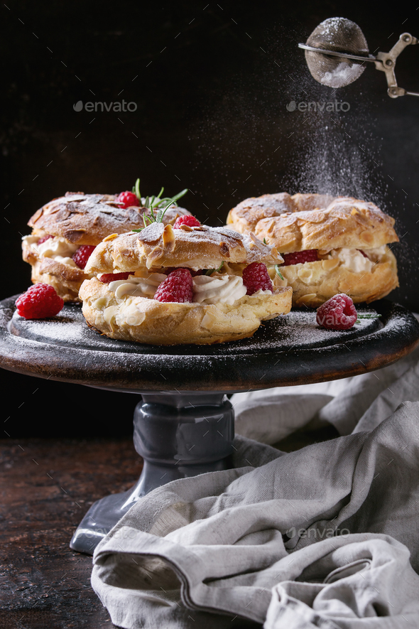 Choux cake Paris Brest with raspberries Stock Photo by NatashaBreen