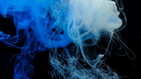 Cloud of Ink Floating Slowly Trough Space, Black Background, Stock Footage