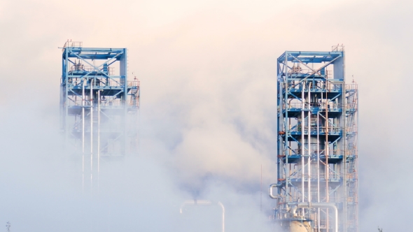 Oil Refinery with Green of Tree Shadow in Background, Environment and ...