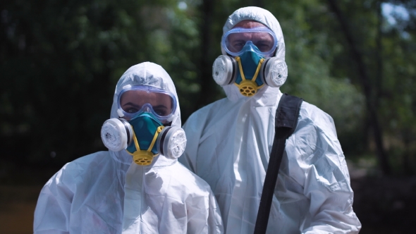 Two Ecologists in Environmental Suits, Stock Footage | VideoHive