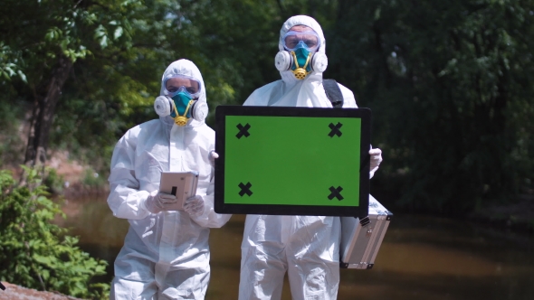 Two Ecologists in Environmental Suits, Stock Footage | VideoHive