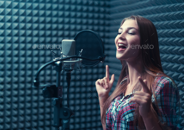 Woman in a recording studio Stock Photo by AboutImages | PhotoDune