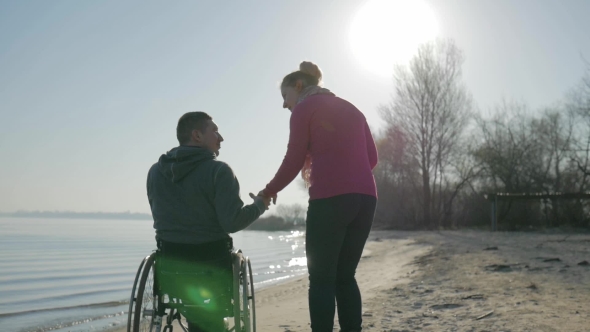 Disabled and Girl Raise Their Hands To Top, Handicapped Person Gives ...