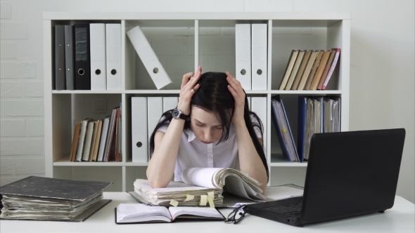Woman Tired of Paperwork in the Office, Stock Footage | VideoHive