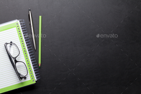 Office desk with notepad and supplies Stock Photo by karandaev | PhotoDune