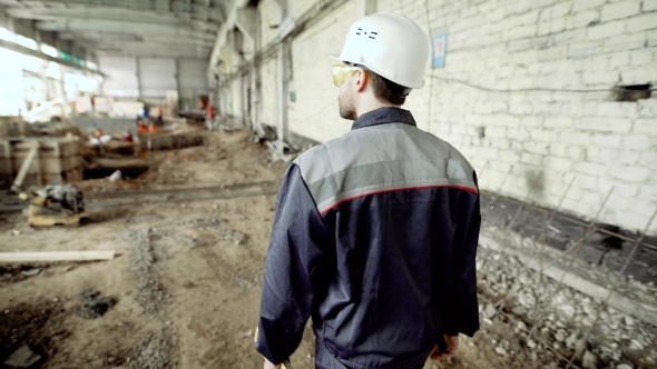 Back View of Construction Worker. Anonymous Man in Hard Hat and Uniform ...