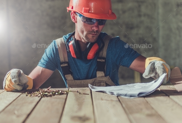 Contractor with Documentation Stock Photo by duallogic | PhotoDune