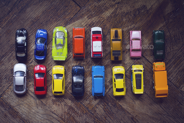 assorted colorful car collection on floor Stock Photo by macondoso