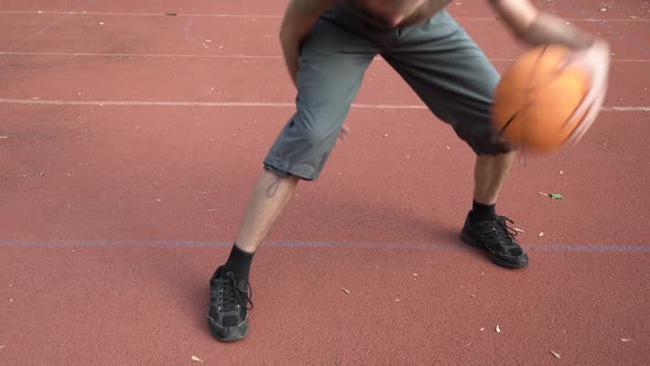 Caucasian Amateur Basketball Player Practicing Ball Handling Skill ...