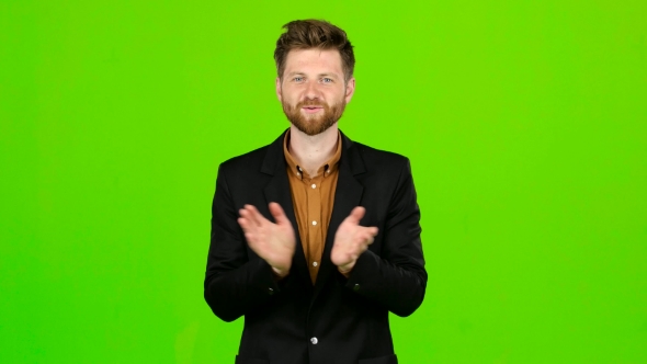 Man Looks at the Concert and Applauds the Actors. Green Screen, Stock ...