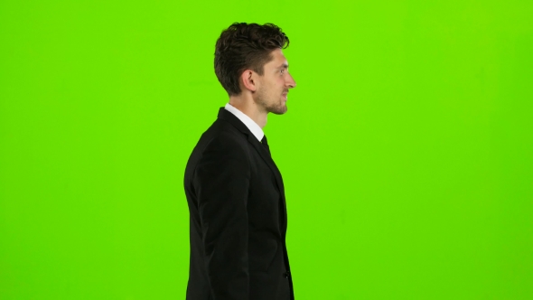 Businessman Is Going To a Meeting and Waving Greetings. Green Screen ...