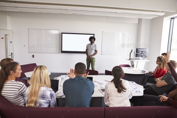 University Students Attending Lecture On Campus Stock Photo by ...