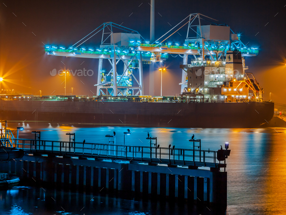 Ship unloading coal in a harbor Stock Photo by CreativeNature_nl ...