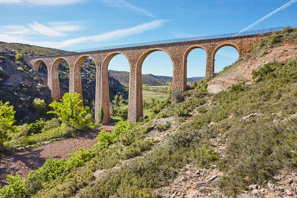 Stone viaduct in Albentosa, Teruel. Spain. Green way. Architecture ...