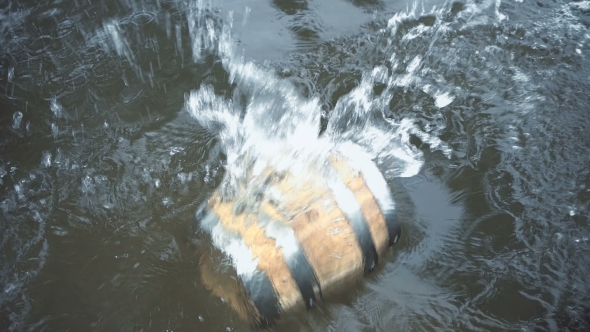 Barrel of Wood Falls Into the Water with Splashes, Stock Footage ...