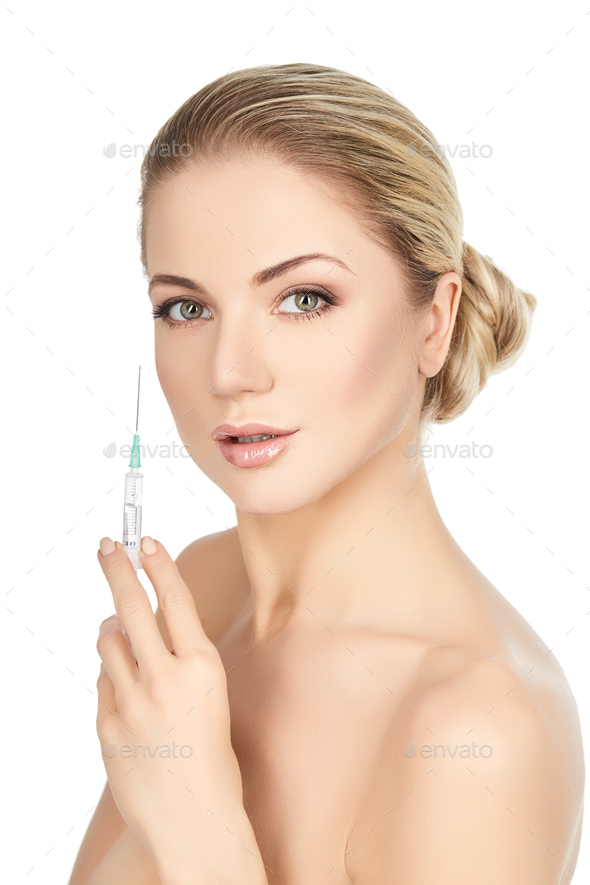 beautiful girl holding syringe isolated on white Stock Photo by Svetography