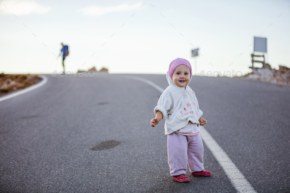 Cute little girl standing on road Stock Photo by photobac | PhotoDune