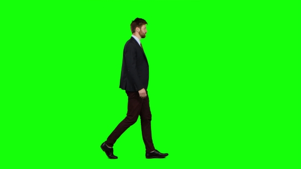 Businessman Is Going To a Meeting and Waving Greetings. Green Screen ...