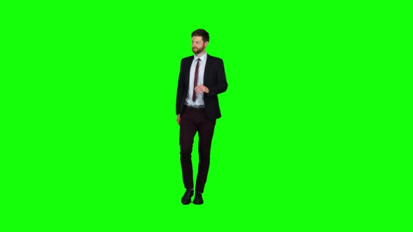Businessman Is Going To a Meeting and Waving Greetings. Green Screen ...
