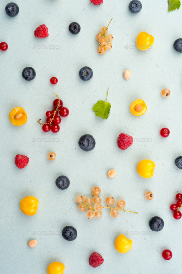 Berries isolated over white background table. Stock Photo by vadymvdrobot
