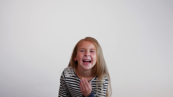 Charming Girl Burst Into Laughter. The Girl Laughs and Covers Her Mouth ...