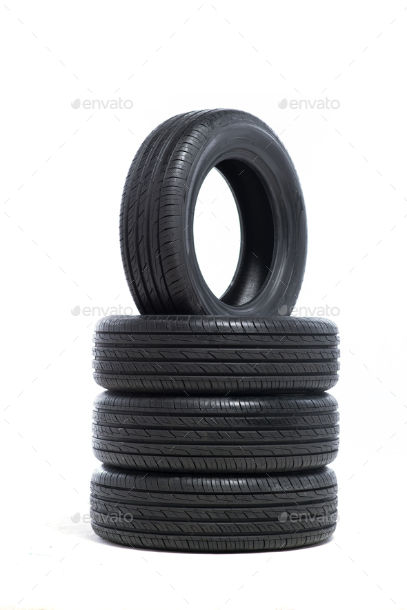 Pile of unused car tires on white background Stock Photo by NomadSoul1