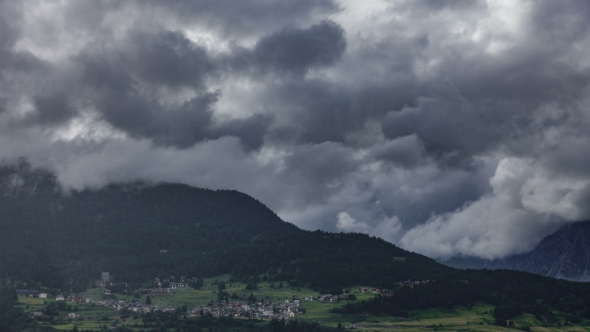 Storm and Rain Over Mountain Town, Stock Footage | VideoHive