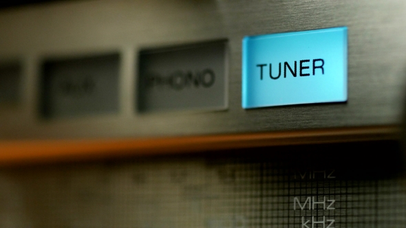 Switching Bright Blue Buttons on Radio Receiver. , Side View, Stock Footage