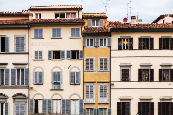 facades of various medieval houses in Florence Stock Photo by vvoennyy