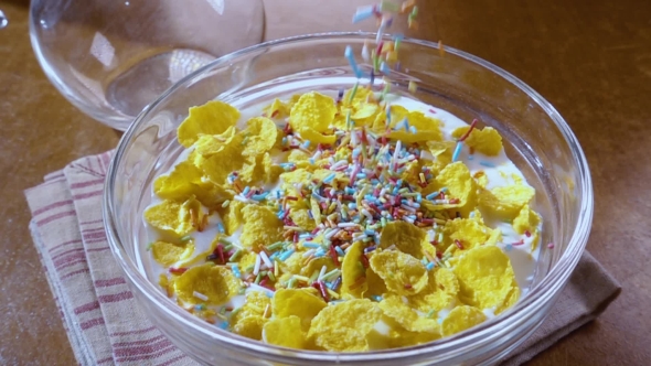 Crispy Yellow Corn Flakes Into the Bowl, Stock Footage | VideoHive