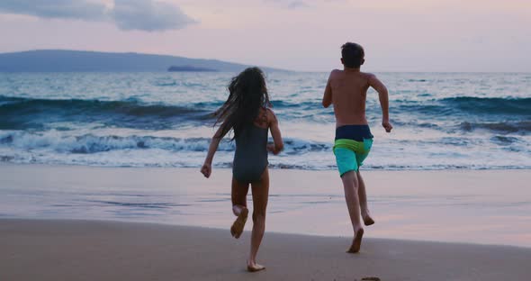Kids Running into The Ocean, Stock Footage | VideoHive