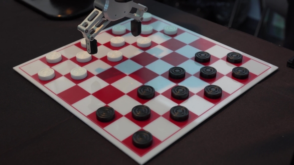 Robot Playing Checkers. Hand Manipulator Moves Checkers., Stock Footage