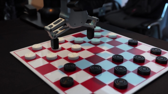 Robot Playing Checkers. Hand Manipulator Moves Checkers., Stock Footage