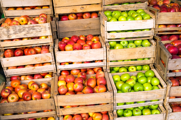 Fresh apples in wooden boxes for sale Stock Photo by elxeneize | PhotoDune