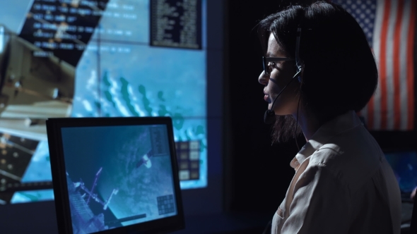 Woman at Computer in Flight Control Center, Stock Footage | VideoHive