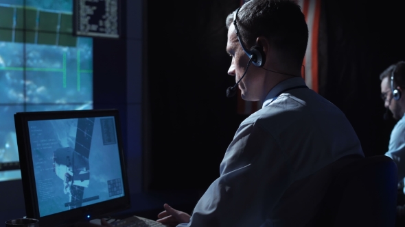 Man in Headset in Flight Control Center, Stock Footage | VideoHive