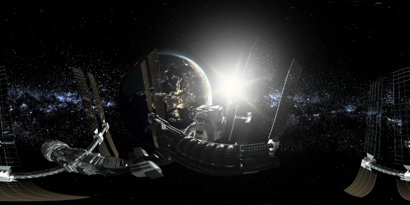 Astronaut and International Space Station Orbiting Earth in Virtual ...