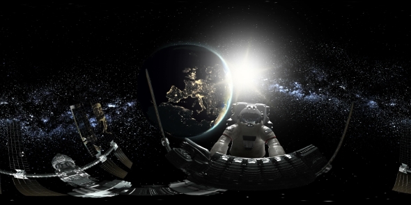Astronaut and International Space Station Orbiting Earth in Virtual ...